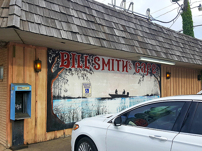 The iconic mural outside Bill Smith's Cafe tells you everything you need to know&mdash;this place values fishing, food, and small-town charm equally.