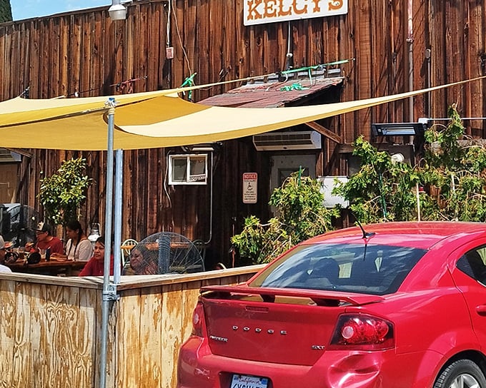 The iconic yellow "CAFE" sign above Kelcy's wooden facade isn't just advertising &ndash; it's a beacon of hope for hungry travelers and locals alike.