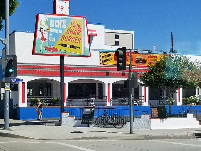 The red-and-white facade of Rick's stands like a time capsule on Whittier Boulevard, beckoning burger enthusiasts with its nostalgic charm.
