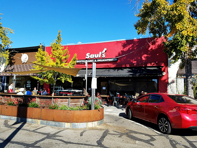 The bright red exterior of Saul's stands like a beacon of deliciousness on Shattuck Avenue, promising comfort food that transcends generations.