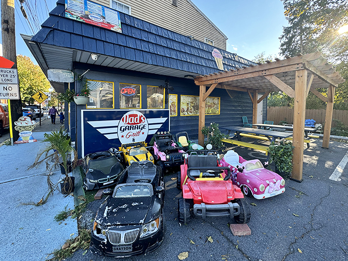 Those toy cars aren't just decoration&mdash;they're the unofficial welcoming committee at Dad's Garage, where automotive nostalgia meets mouthwatering burgers in perfect harmony.