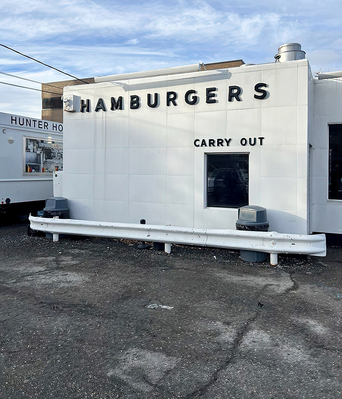 The gleaming white exterior of Hunter House stands like a time capsule on Birmingham's streets&mdash;a burger beacon that's been drawing devotees for generations.