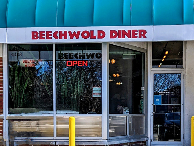 The iconic turquoise awning of Beechwold Diner beckons like a beacon of breakfast hope on Indianola Avenue. No fancy frills, just honest food awaiting inside.