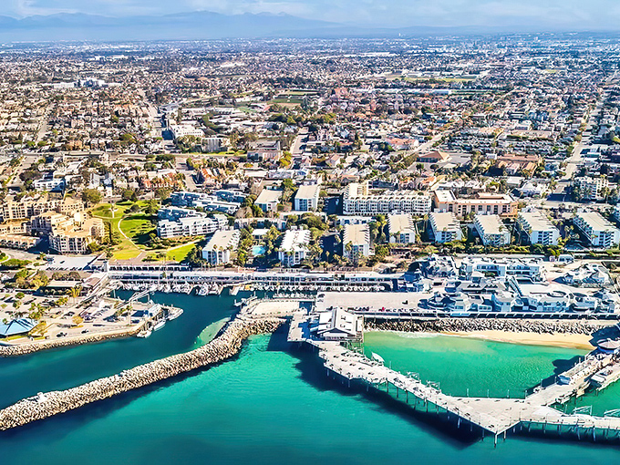 The marina's horseshoe shape creates a perfect turquoise embrace, like Mother Nature designed her own infinity pool with boats.