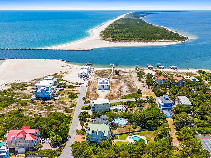 Where the Gulf meets the bay, this slender paradise offers the rare luxury of water views in every direction.