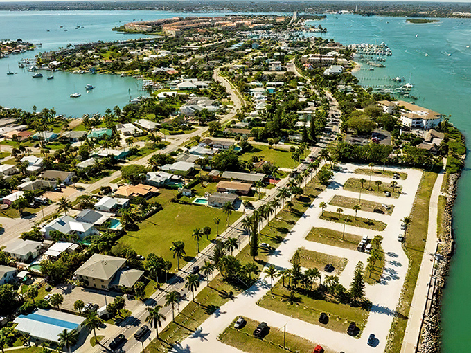Fort Pierce's waterfront paradise unfolds like a living map, where aquamarine waters embrace neighborhoods that seem designed by someone who actually understands the concept of beauty.