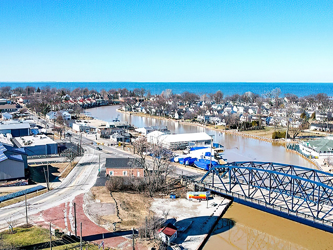 Winter's touch transforms Vermilion into a postcard-perfect scene where the river meets Lake Erie, complete with the town's iconic blue bridge.