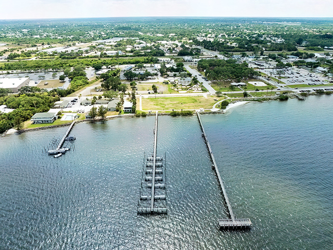 Sebastian's waterfront charm unfolds like a postcard come to life, where boats bob gently against wooden docks and palm trees sway in perfect Florida rhythm.