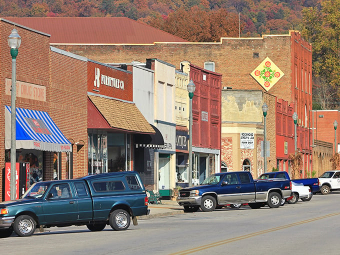 Downtown Rockwood's historic brick buildings stand like sentinels of simpler times, their warm facades glowing against the autumn-painted Cumberland foothills.