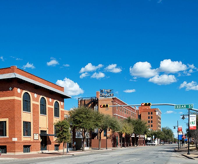 Downtown Abilene welcomes you with classic brick architecture and wide-open skies, where history and modern life dance together on sun-drenched streets.