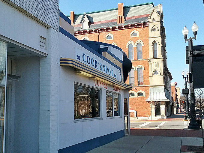 The iconic white and blue facade of The Spot has been welcoming hungry Ohioans since 1907, standing proudly on Sidney's courthouse square like a time capsule of Americana.