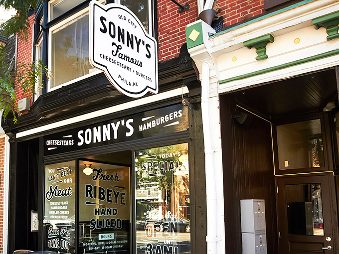 The black and white storefront speaks volumes: "Fresh Ribeye Hand Sliced" isn't just signage&mdash;it's a solemn promise to your taste buds.