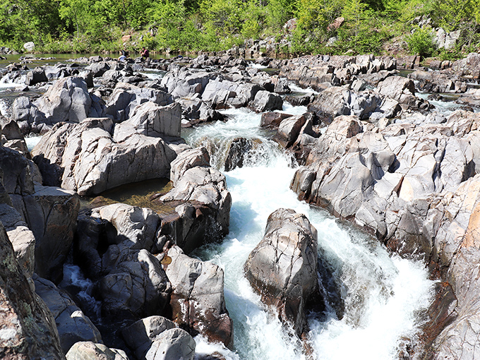 Mother Nature's water park in full glory &ndash; rushing chutes and swirling pools carved by time itself through pink granite.