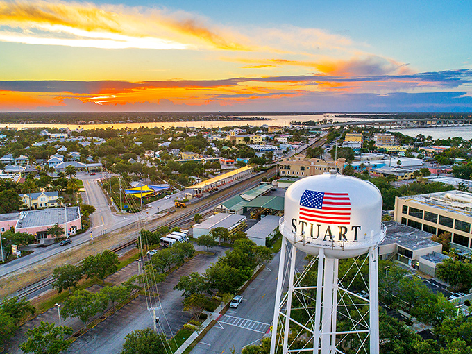 Stuart's iconic water tower stands sentinel over this charming coastal town, where golden sunsets paint the sky and waterways embrace the landscape.
