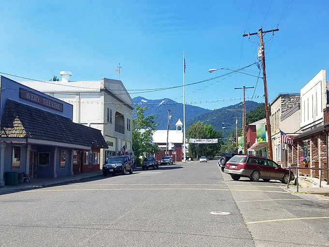 Main Street Etna welcomes you with its historic Avery Theatre marquee and mountain backdrop &ndash; small-town charm that's big on character.