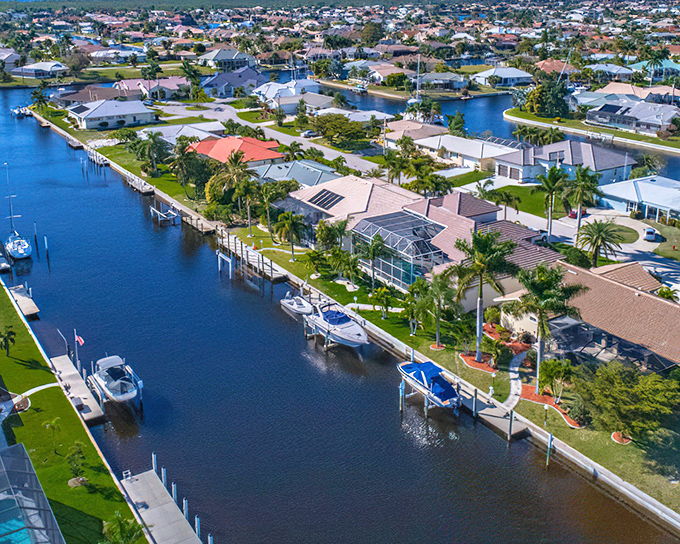 Port Charlotte's waterfront neighborhoods offer that perfect Florida dream &ndash; canals, greenery, and homes where your morning coffee comes with a water view.