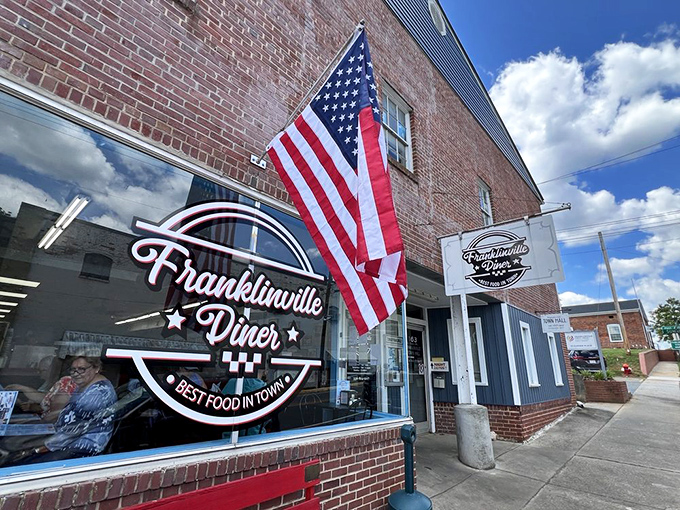 The American flag stands proud outside this brick-faced treasure &ndash; Franklinville Diner promises "Best Food in Town" and delivers on that patriotic pledge.