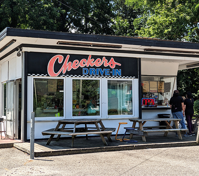 The classic black and white checkerboard pattern isn't just decoration&mdash;it's a promise that time-honored flavors await inside this unassuming Perry treasure.