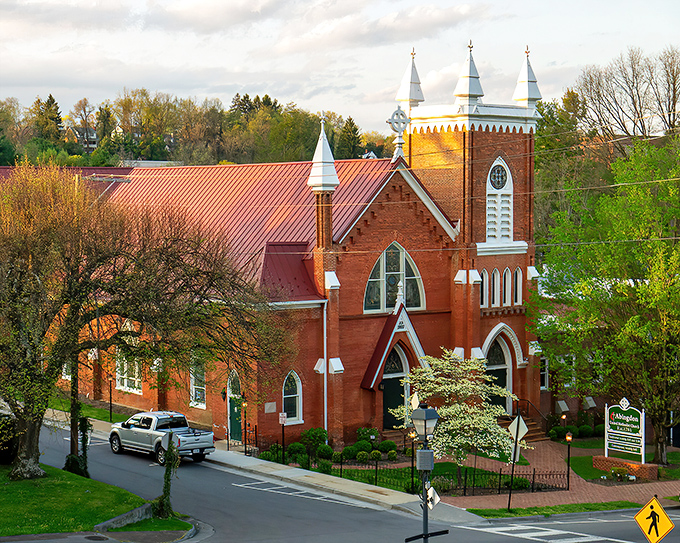 The historic brick church stands as Abingdon's architectural crown jewel, its steeples reaching skyward like a postcard from another era.
