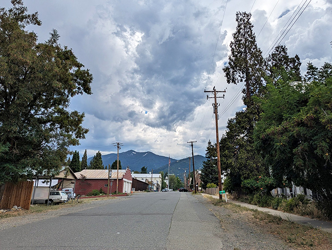 Main Street Etna welcomes you with its historic Avery Theatre marquee and mountain backdrop &ndash; small-town charm that's big on character.