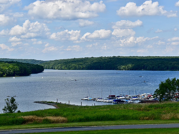 Glendale Lake stretches like a blue ribbon through the forest, where boats dot the water and Pennsylvania's natural splendor unfolds in every direction.