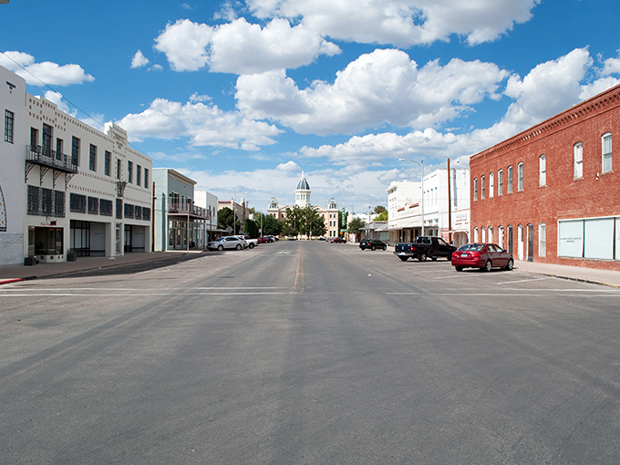 Marfa's main street stretches toward infinity under that legendary West Texas sky. Small-town charm with big artistic ambitions.