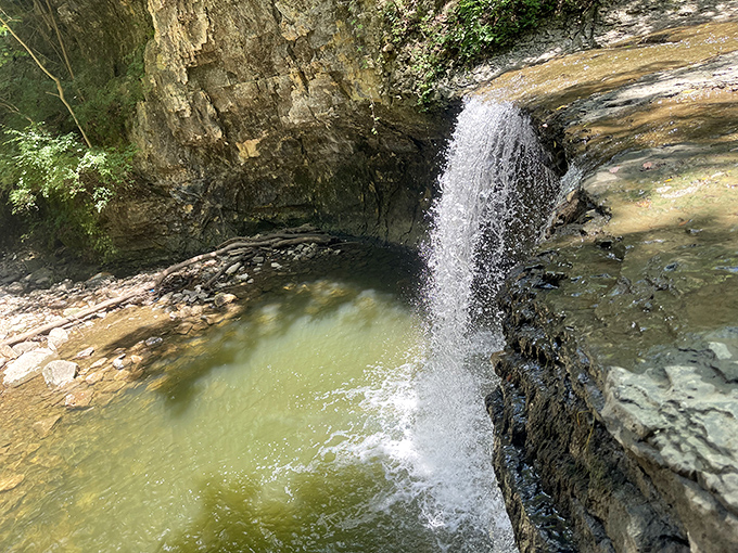 Nature's perfect curtain call &ndash; sheets of water cascade over ancient limestone, creating a mesmerizing display that seems choreographed just for you.