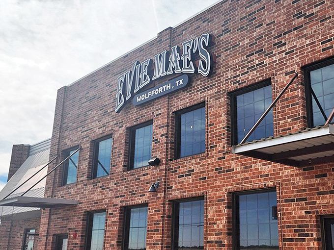 The brick fortress of flavor stands proudly against the Texas sky, a temple where smoke signals announce "come and get it" to barbecue pilgrims.