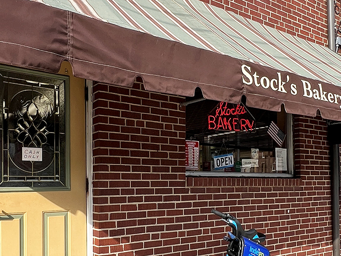 This brick-and-awning combo screams "your neighborhood's best-kept secret" louder than a South Philly argument.