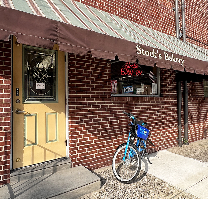 The iconic yellow door of Stock's Bakery stands like a beacon of hope for dessert lovers across Philadelphia's Port Richmond neighborhood.