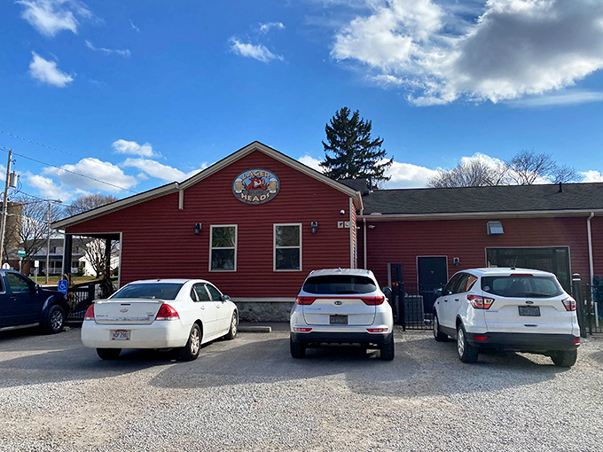 The bright red exterior of Lager Heads stands like a beacon of barbecue hope in Medina, promising smoky delights within those humble walls.