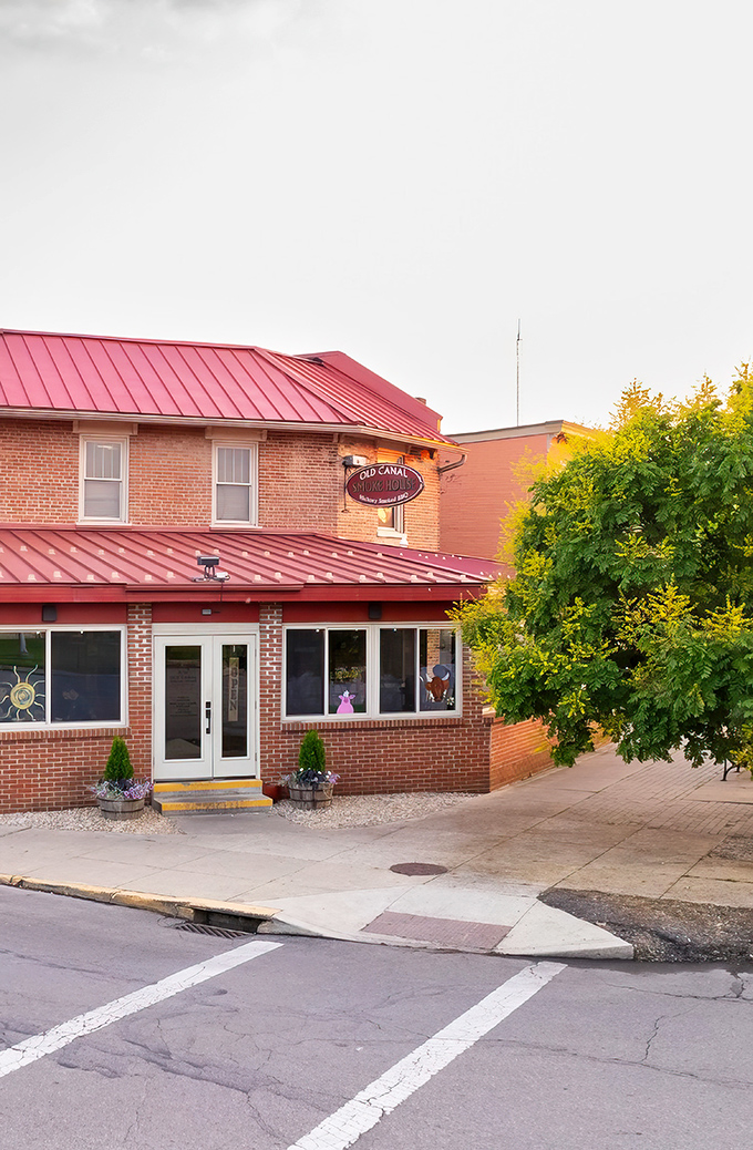 That distinctive red roof and vintage sign announce your arrival at barbecue nirvana. The aroma of hickory smoke will guide you the rest of the way.