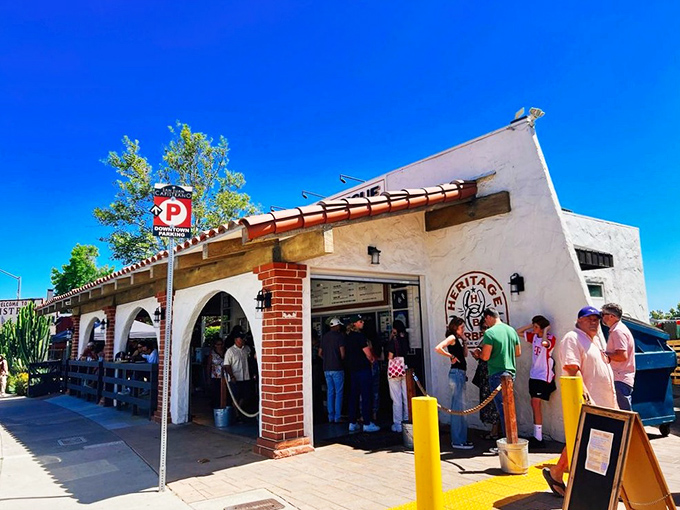 The unassuming exterior of Heritage Barbecue hides a smoky paradise within. Like finding a Picasso at a yard sale, this modest building houses barbecue greatness.