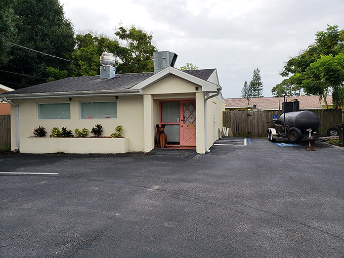 No fancy frills here&mdash;just the promise of smoky perfection waiting beyond these humble walls.