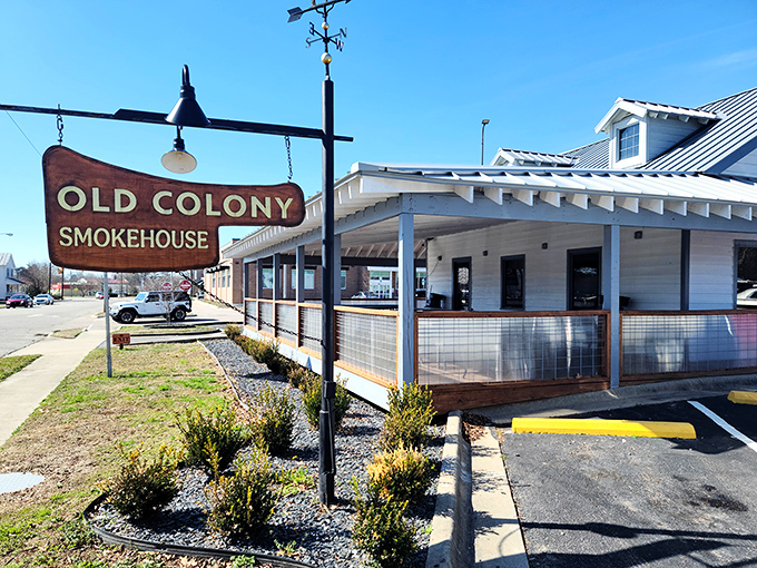 That weathered sign beckons like a beacon of barbecue bliss, promising smoky treasures within this charming Edenton gem.