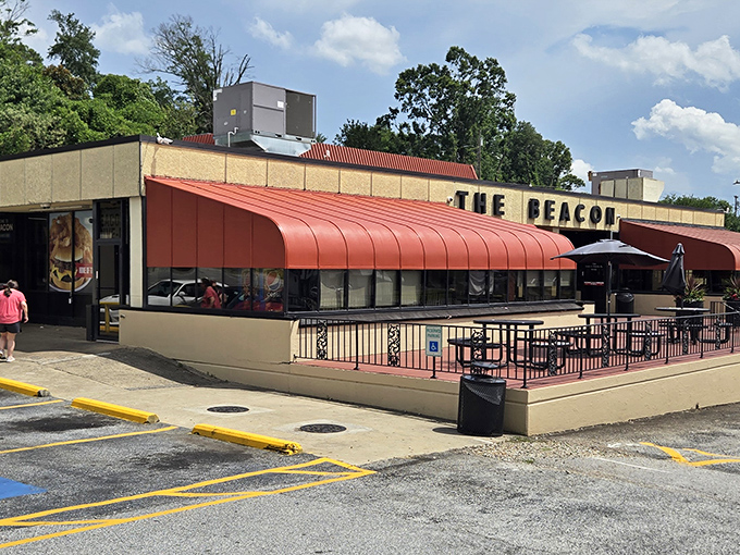 From this angle, you can almost smell the burgers sizzling behind those windows. The Beacon's distinctive architecture has welcomed generations of diners.