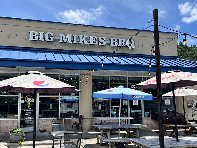 String lights and colorful umbrellas frame the entrance like a beacon to barbecue pilgrims. This isn't just a restaurant&mdash;it's a destination for those serious about their smoked meats.