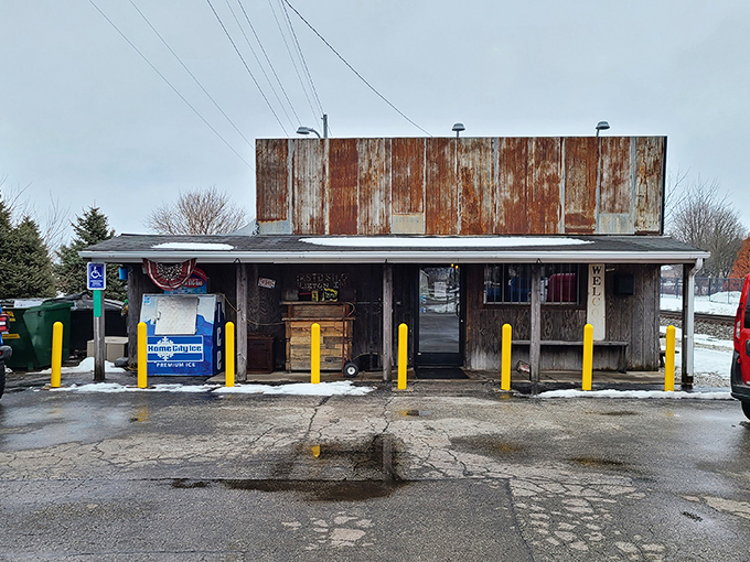 The rusted metal exterior isn't just for show&mdash;it's a promise of authenticity that says, "We're serious about barbecue, not interior design."