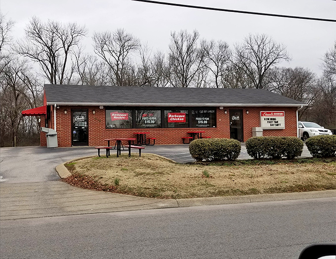 Humble brick exterior, mighty flavors within. This unassuming BBQ joint proves that in Tennessee, the most spectacular smoke signals come from the most modest buildings.
