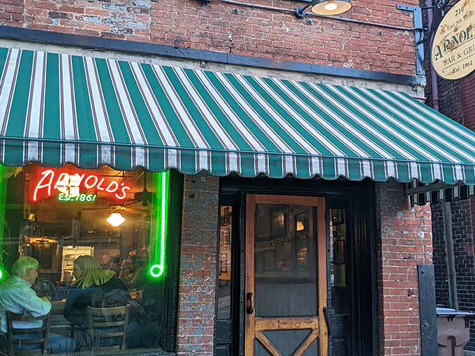 That iconic striped awning and vintage sign aren't trying to be retro-cool&mdash;they're the real deal, standing sentinel on Cincinnati's East 8th Street since long before "vintage" was trendy.