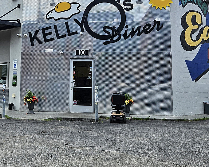 The silver facade of Kelly O's gleams like a beacon for breakfast pilgrims, complete with that iconic sunny-side-up egg logo promising morning salvation.