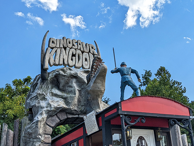 The grand entrance to alternate history &ndash; a Union soldier stands atop the Dinosaur Kingdom sign, perhaps regretting his life choices.