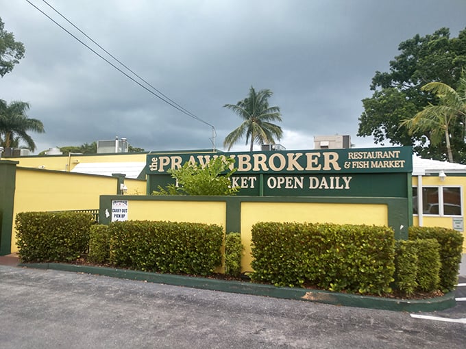 The yellow walls and swaying palms of The Prawnbroker stand like a cheerful beacon for seafood lovers. Florida architecture at its most honest &ndash; unpretentious yet promising. 