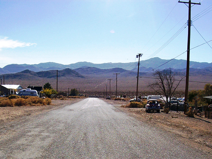 Welcome to Darwin, where the road sign might be the most populated spot in town. Those mountains aren't just scenery&mdash;they're neighbors.