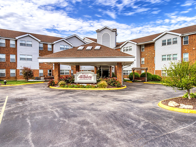 The Villa at Riverwood welcomes you with architectural charm that says "resort living" rather than "retirement home." No bingo cards required at the entrance. 