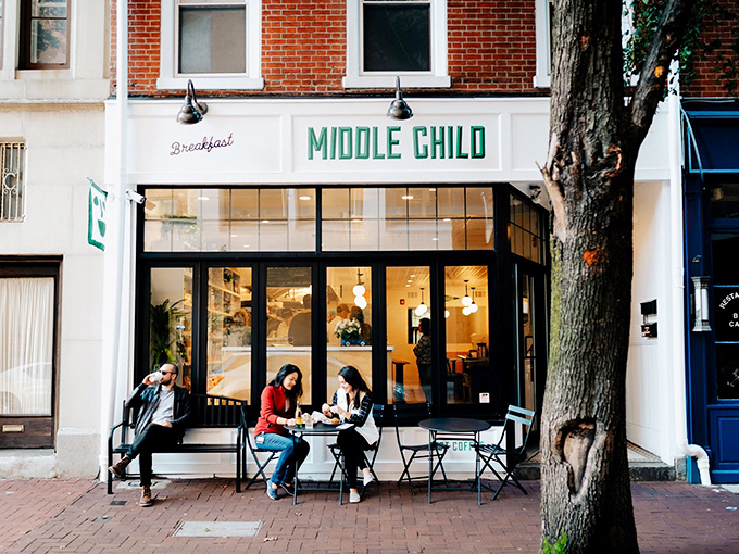 The charming storefront of Middle Child beckons with its crisp white facade and bold green lettering&mdash;Philadelphia's sandwich paradise hiding in plain sight.