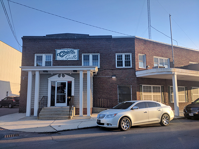 The brick facade of Chud's Grille stands proudly on Fremont's Napoleon Street, a beacon of comfort food that's been drawing locals for generations.