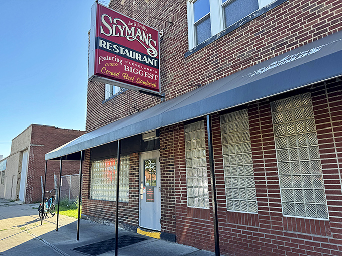 The iconic red Slyman's sign beckons hungry Clevelanders like a meaty lighthouse in a sea of ordinary lunch options.