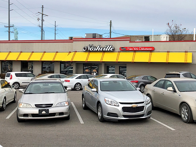 That iconic yellow awning is like a beacon of deli hope in a sea of Nashville hot chicken. Noshville's exterior promises New York authenticity with Tennessee hospitality.