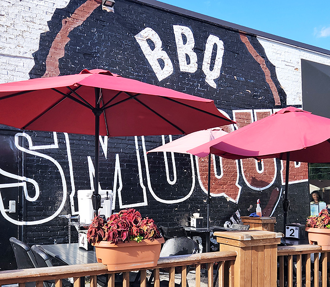 Smoque's iconic black and white exterior wall art isn't just signage&mdash;it's a beacon of hope for barbecue pilgrims seeking salvation through smoke.